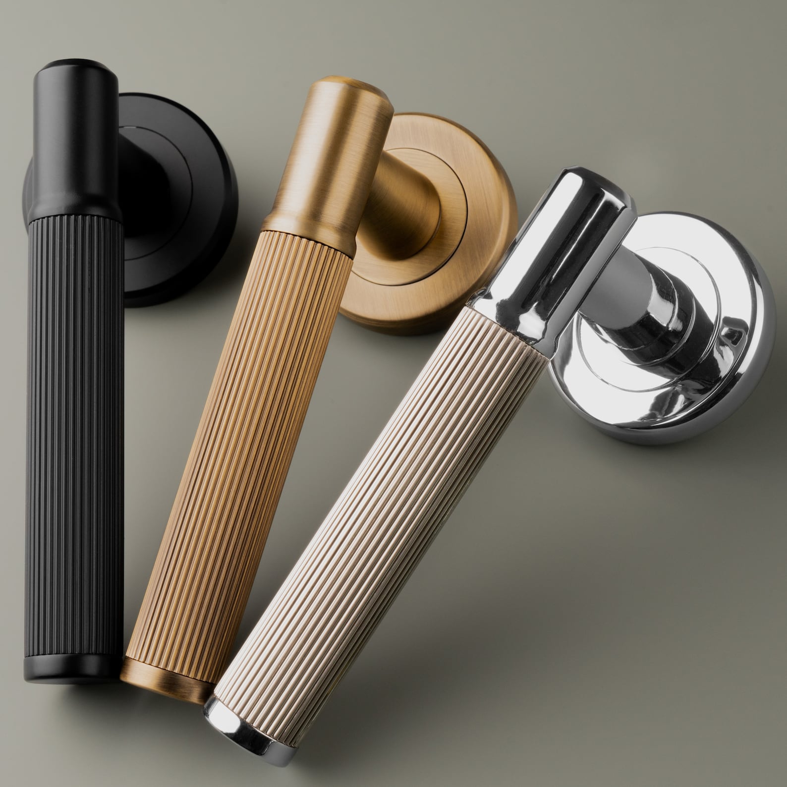 Pair of Reeded Lever Door Handles on Concealed Round Rose. Lined ...