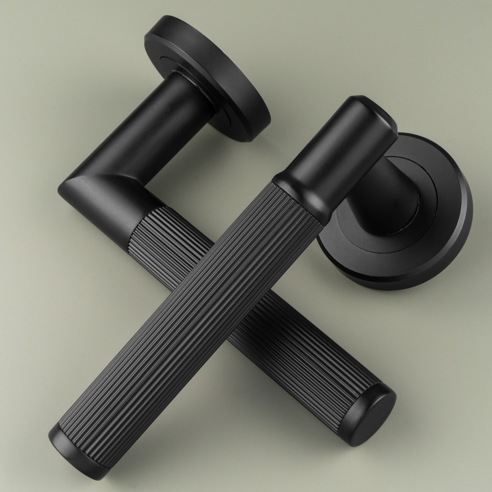 Pair of Reeded Lever Door Handles on Concealed Round Rose. Lined ...