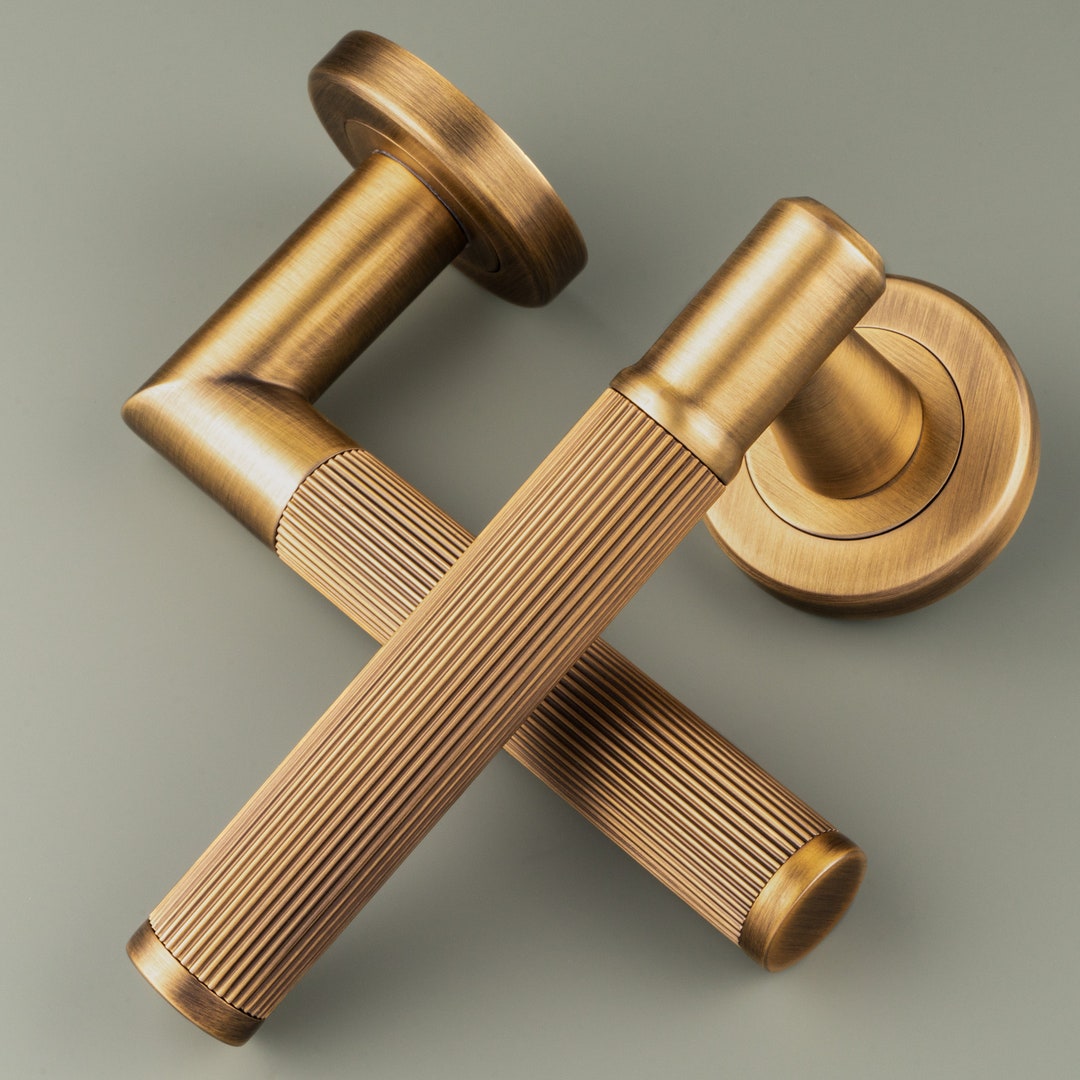 Stunning New Lines Lever on Round Rose Door Handle. Pair of Door ...
