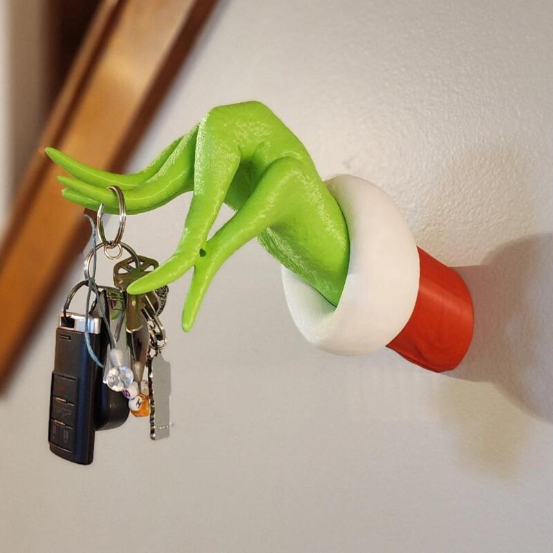 La mano del grinch - Etsy México