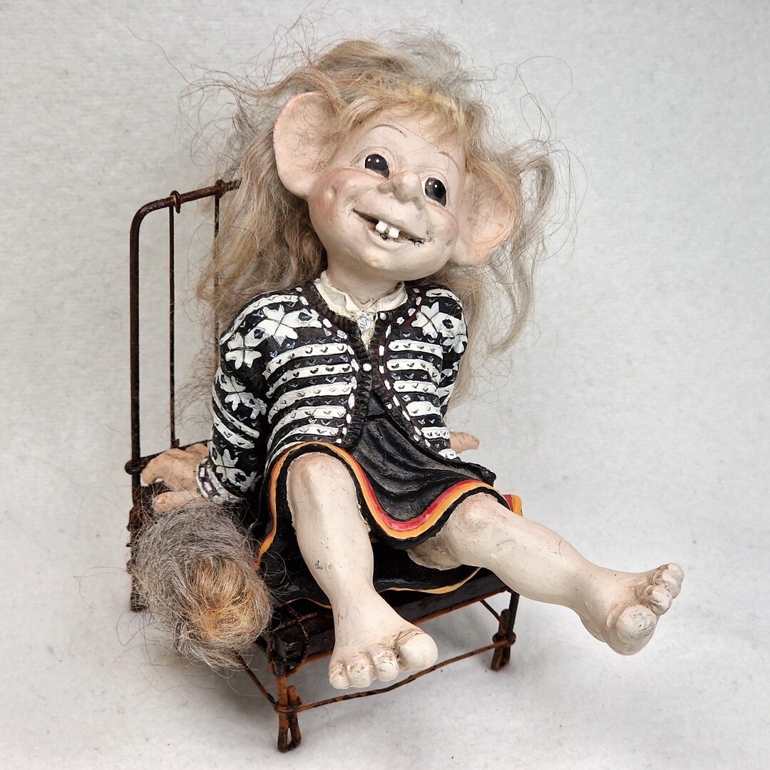 Candy Design Norway. Troll Girl Sitting on a Metal Chair. Ceramic ...