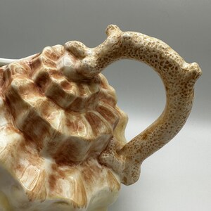 Ceramic Shell Shaped Pitcher With Handle Tones of Beige and Pink ...