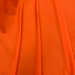 Solid Matte Orange Four Way Stretch Nylon Spandex Fabric by the Yard ...