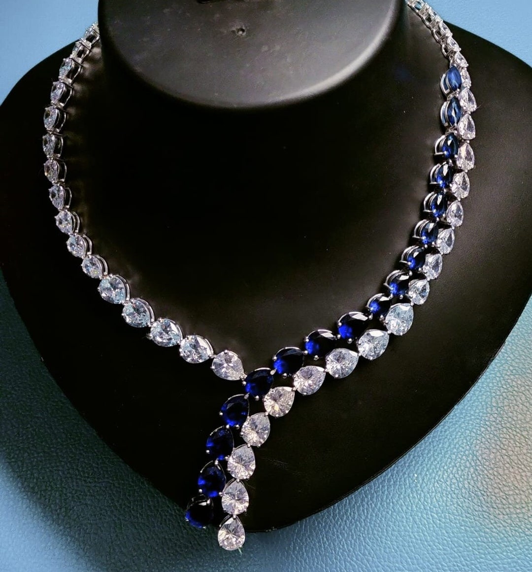Collar de tenis con zafiro azul y pera blanca de 15 quilates creado en ...