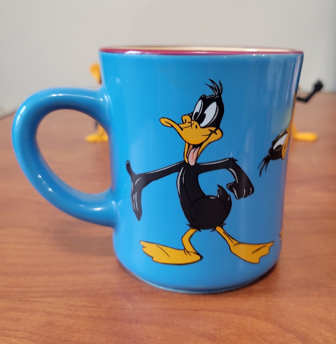 1998 Warner Brothers Studio Daffy Duck Coffee Mug and Four Plastic ...