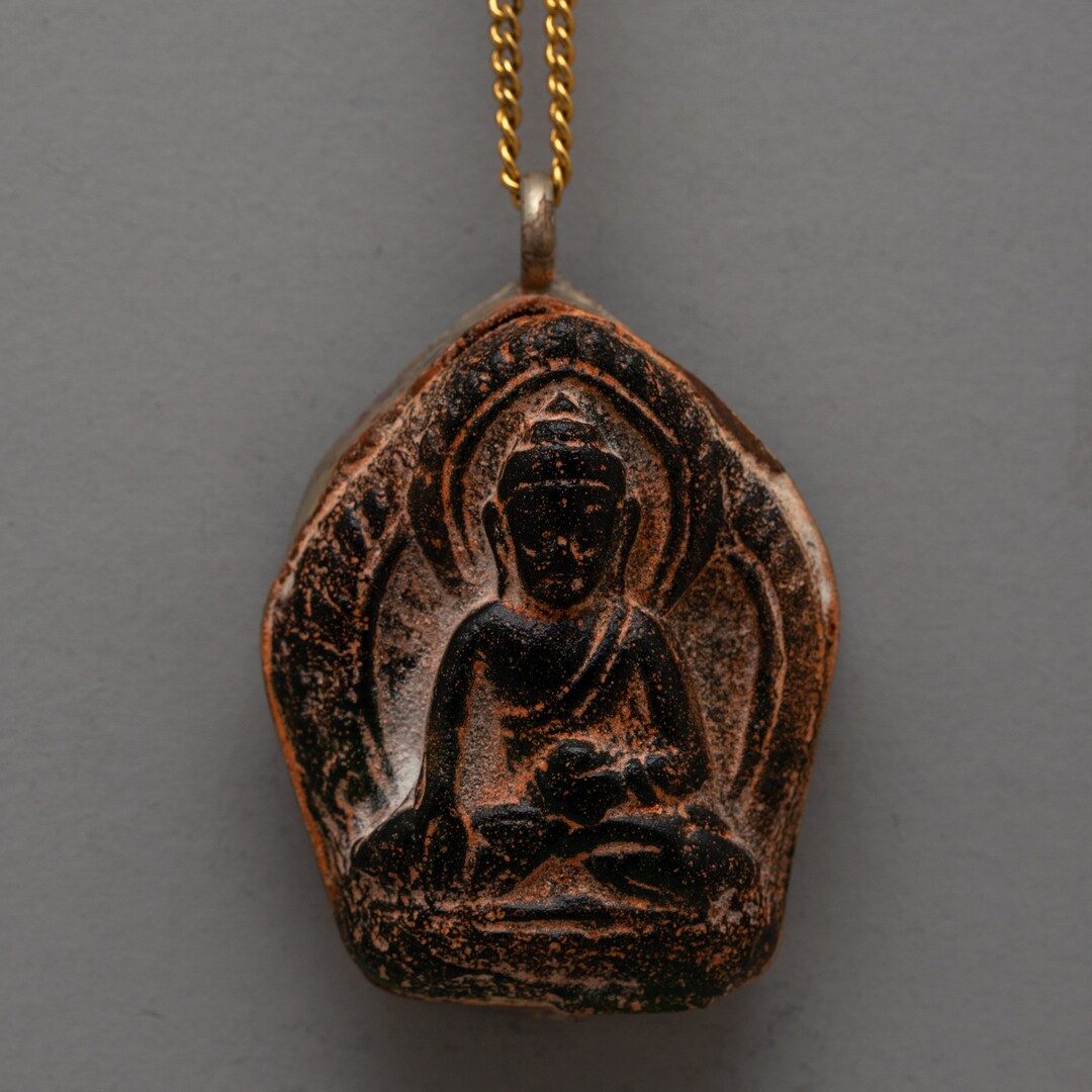 Tibetan Buddha Locket: Symbol of Enlightenment and Serenity ...