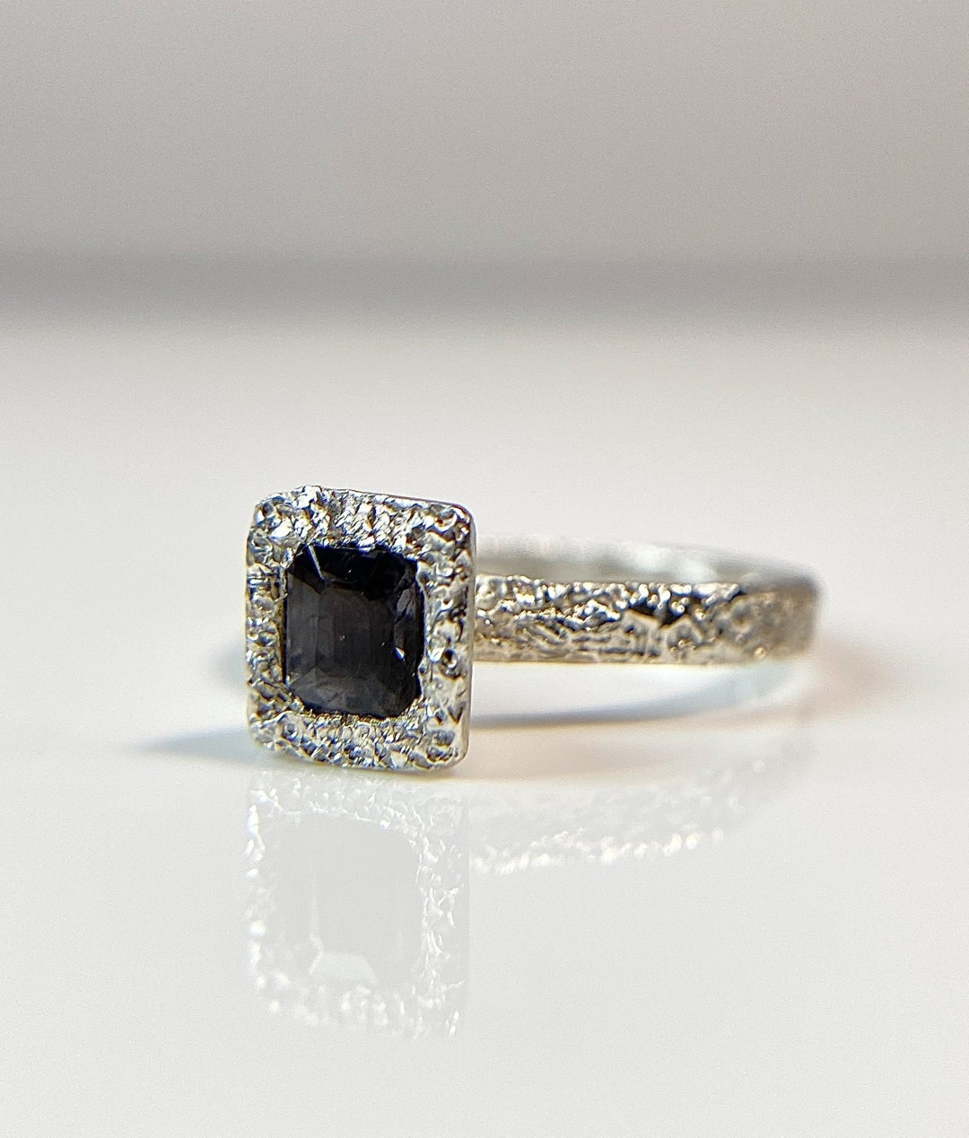 Modern Black Spinel Engagement Ring, Textured Silver Band With Emerald ...