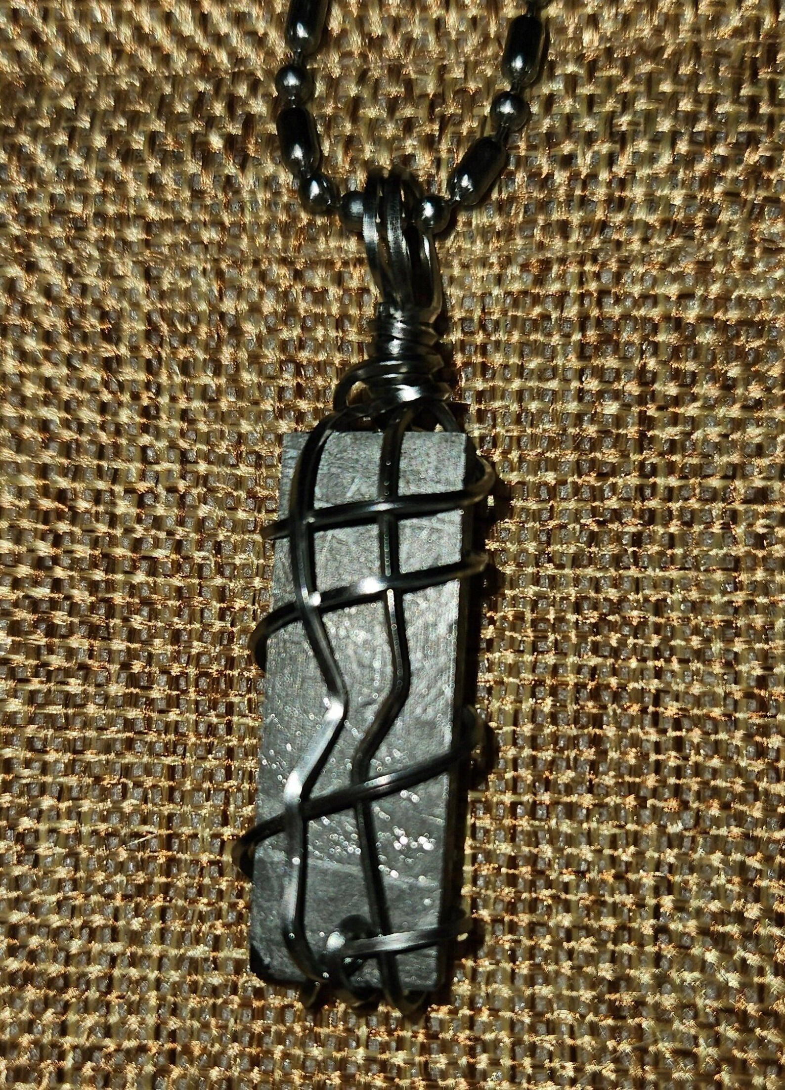 Eclipse 24 Gibeon Meteorite: Gibeon Meteorite Hand-wrapped in Stainless ...