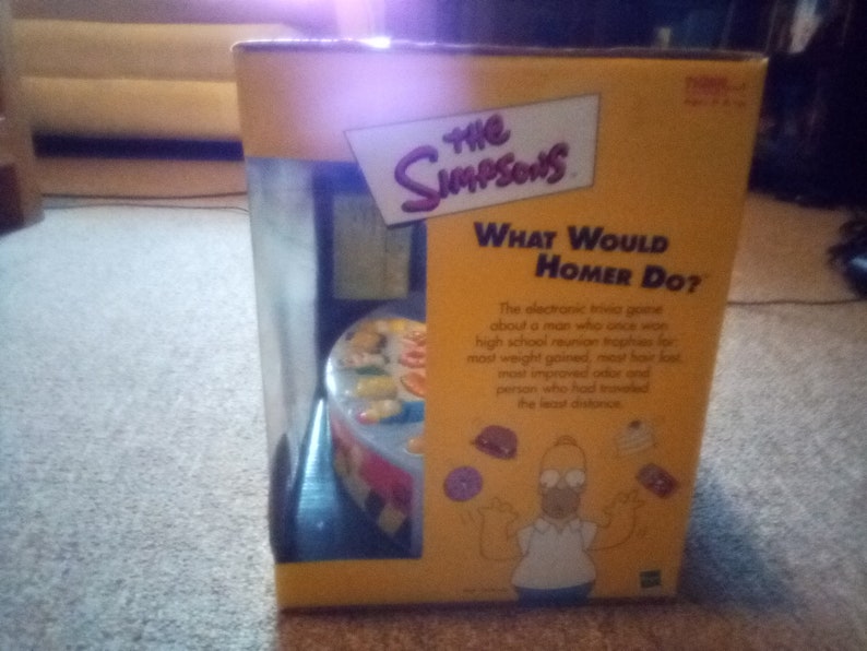 What Would Homer Do Electronic Triva Game and Rubik's Simpsons Puzzle ...