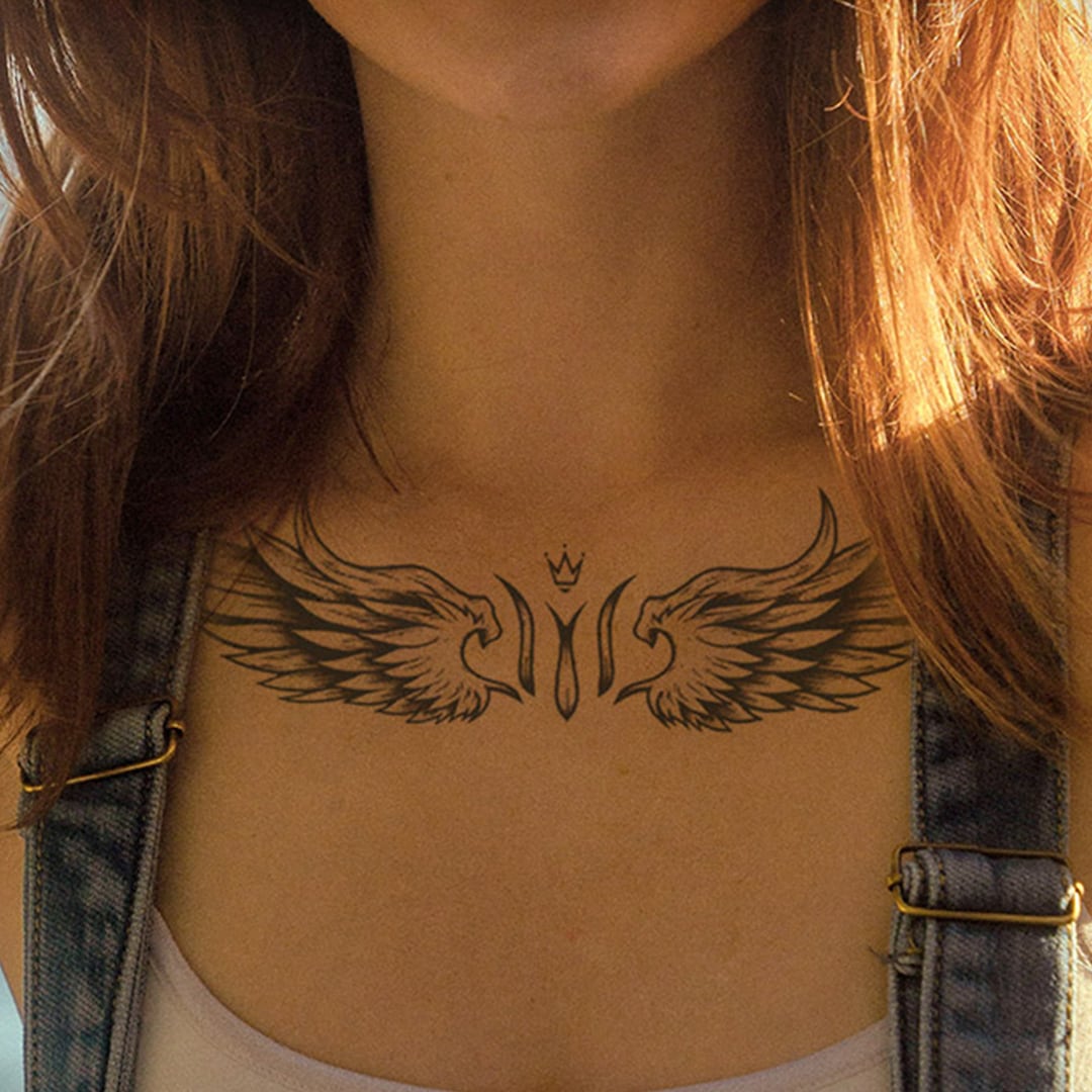 Angel Wings Tattoos On Chest