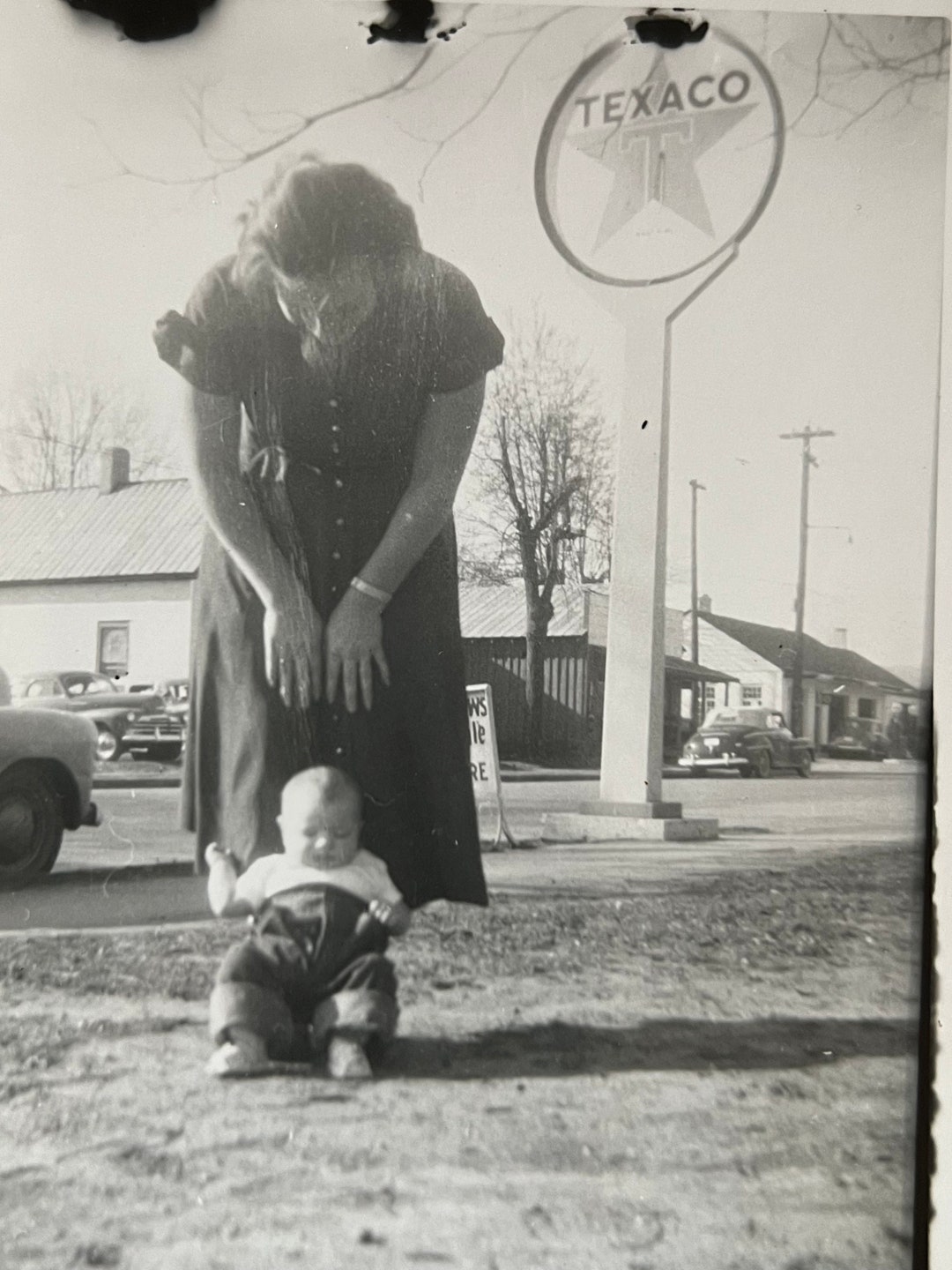 Baby Buzzy Bishop at the Texaco Mom Plays With Baby at Gas Station ...