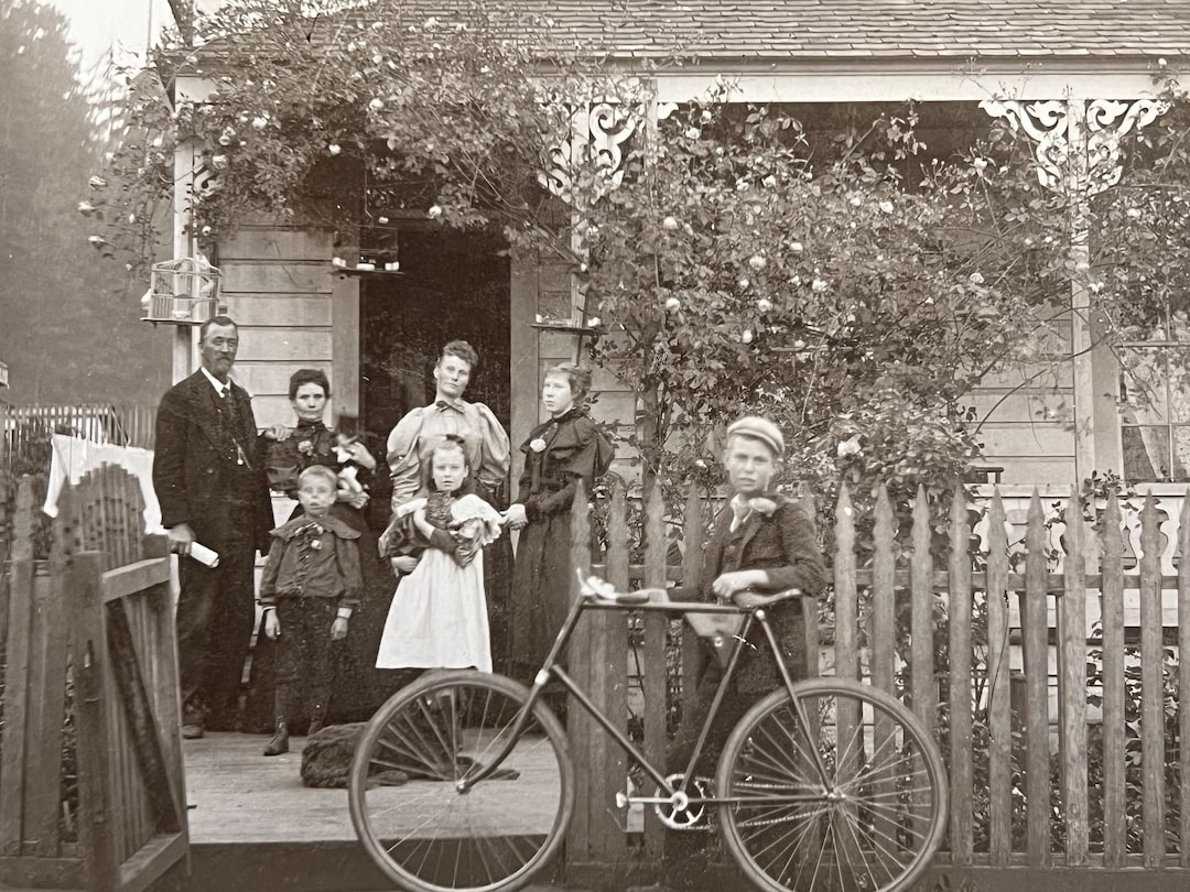 Paperboy in Route! Cute Young Man on Bike With Family and Old House ...