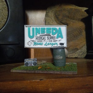 Uneeda Return of the Living Dead Sign Zombie Prop Horror Shelf Display ...
