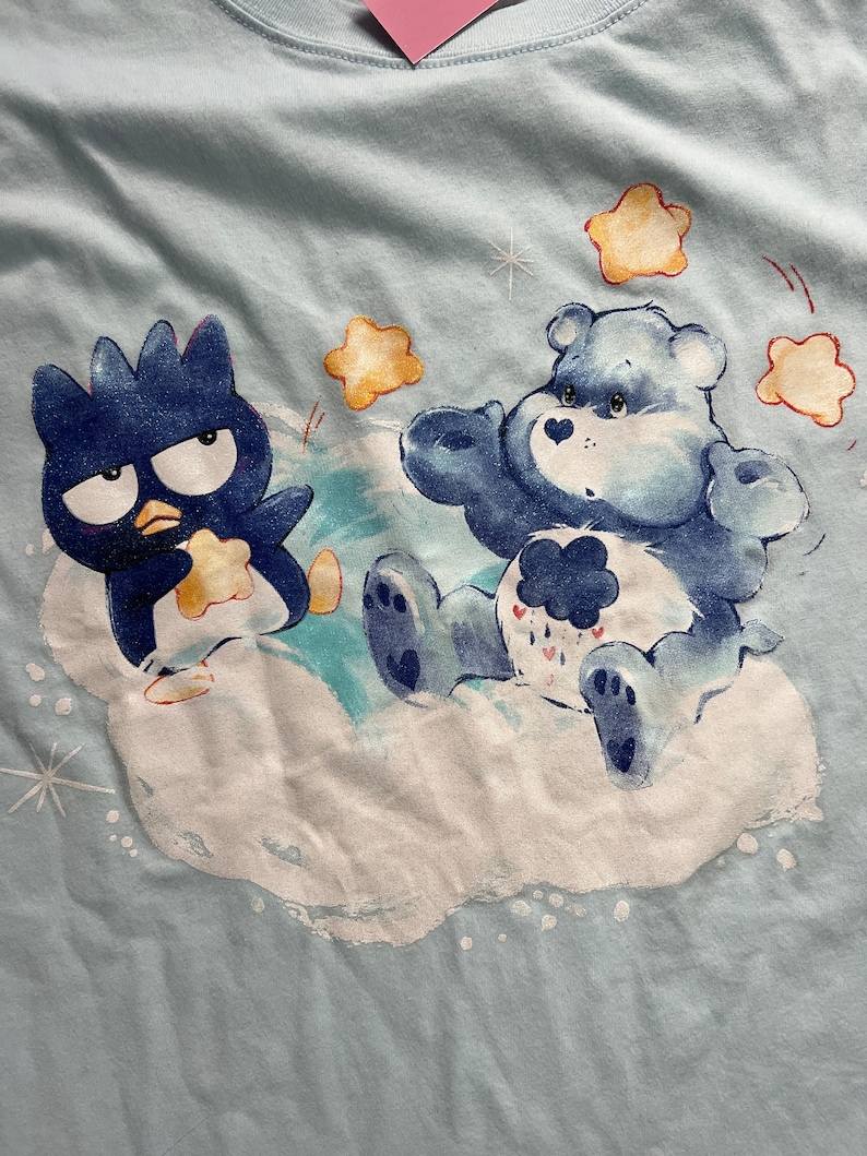Sanrio Hello Kitty X Care Bears Collection Badtz Maru / Grumpy Bear Tee ...