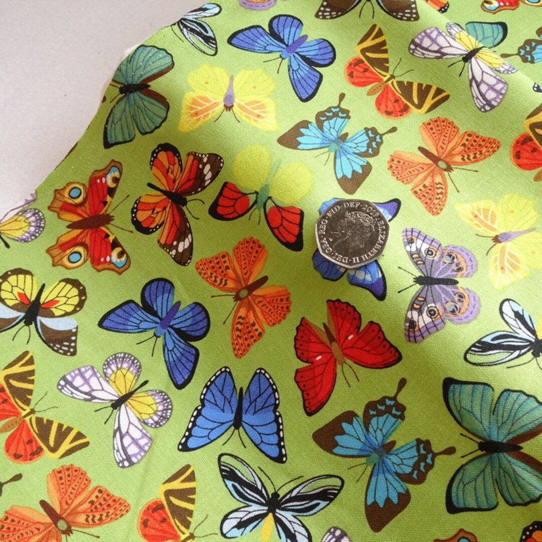 John Louden 100% Cotton- Bright Fluttering Butterflies on Green ...