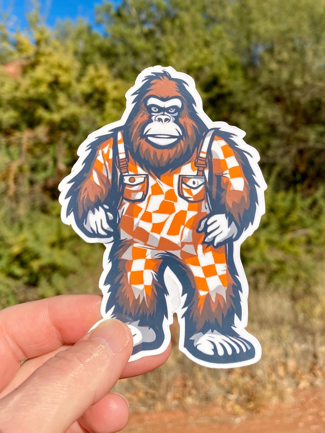 Bigfoot Wearing Orange and White Checkered Overalls Sticker. UT Vols ...