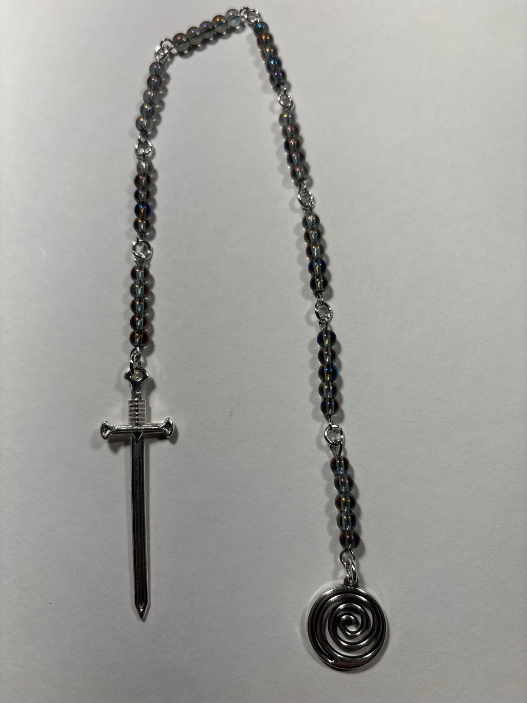Small Iridescent Bead and Sword Pendulum - Etsy