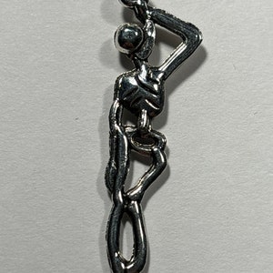 Skull & Crossbones and Skeleton Pendulum - Etsy