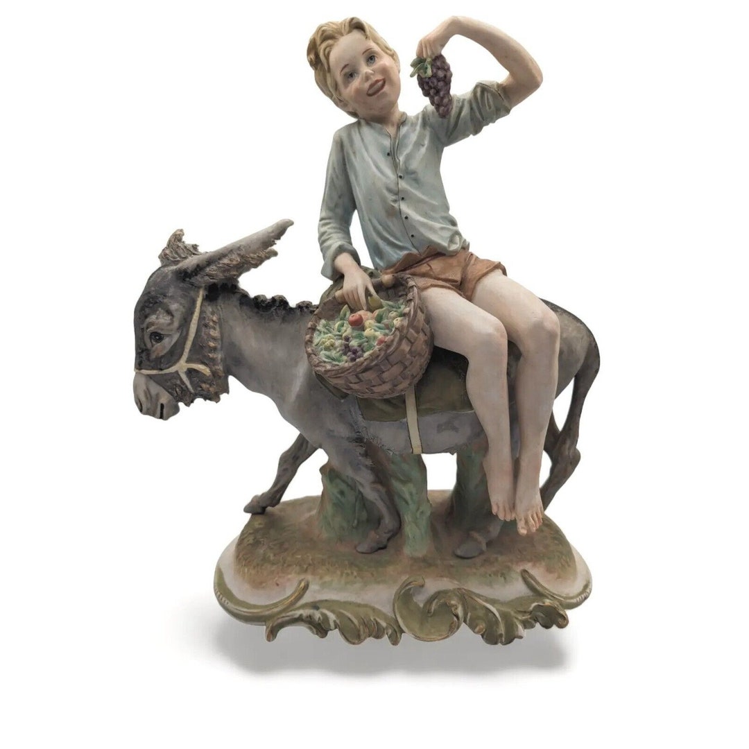 CAPODIMONTE Figurine "boy on Donkey Eating Graoes" by GIUSEPPE CAPPE - Etsy