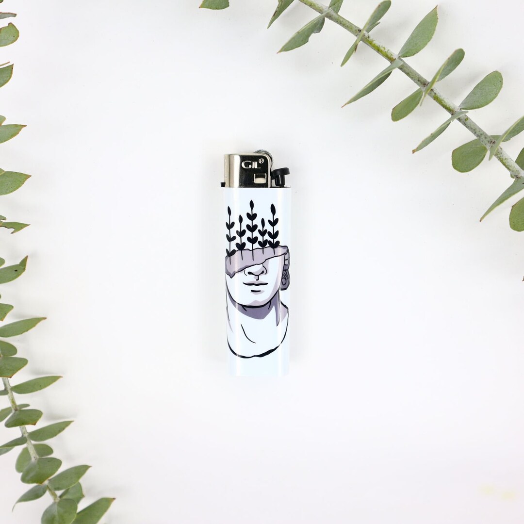 Half Head Sculpture With Black Flowers - Gift Lighter | Original ...