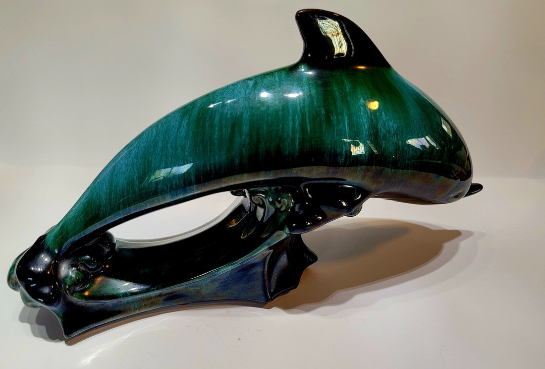 Blue Mountain Dolphin, Dolphin Rests on It's Nose and Tail. Turquoise ...