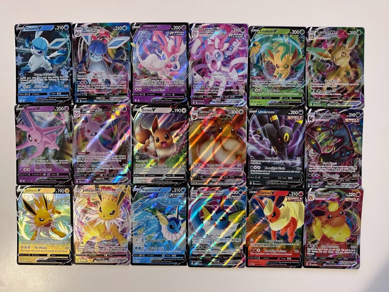 Eevee and Evolutions Pokemon Pack 10 Cards With Holo Foil Promo and ...