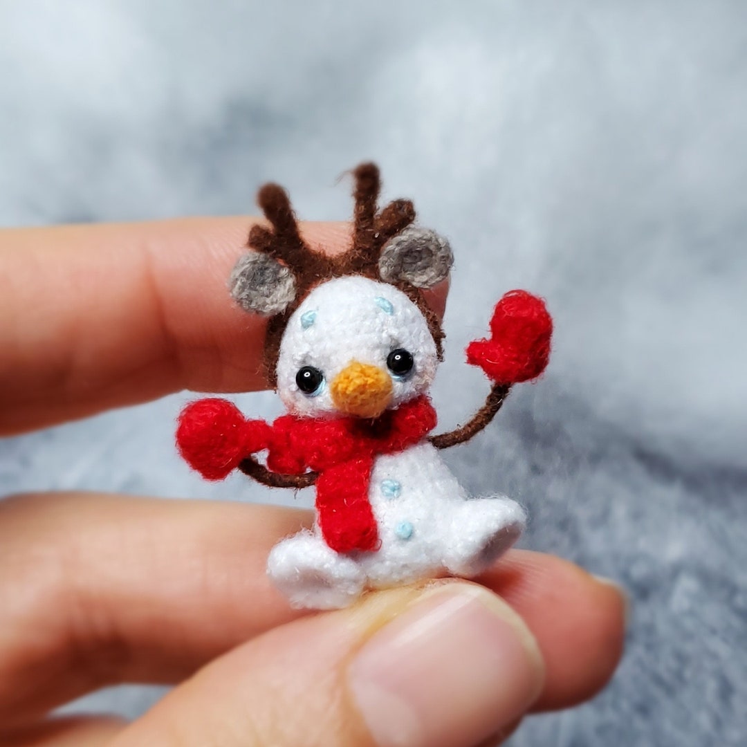 A Charming Snowman and His Cute Accessories: a Scarf, Mittens, and a ...