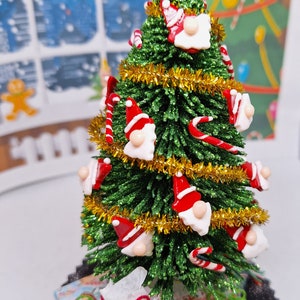 Miniature Christmas Tree Ready for the Holidays Packages Under the Tree ...