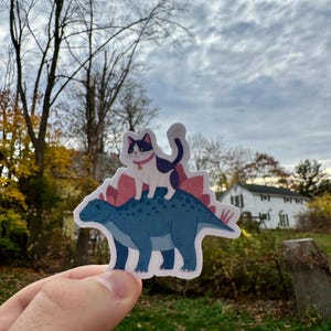 Cute Cat Riding Dinosaur Sticker Fun and Whimsical Vinyl Decal for ...