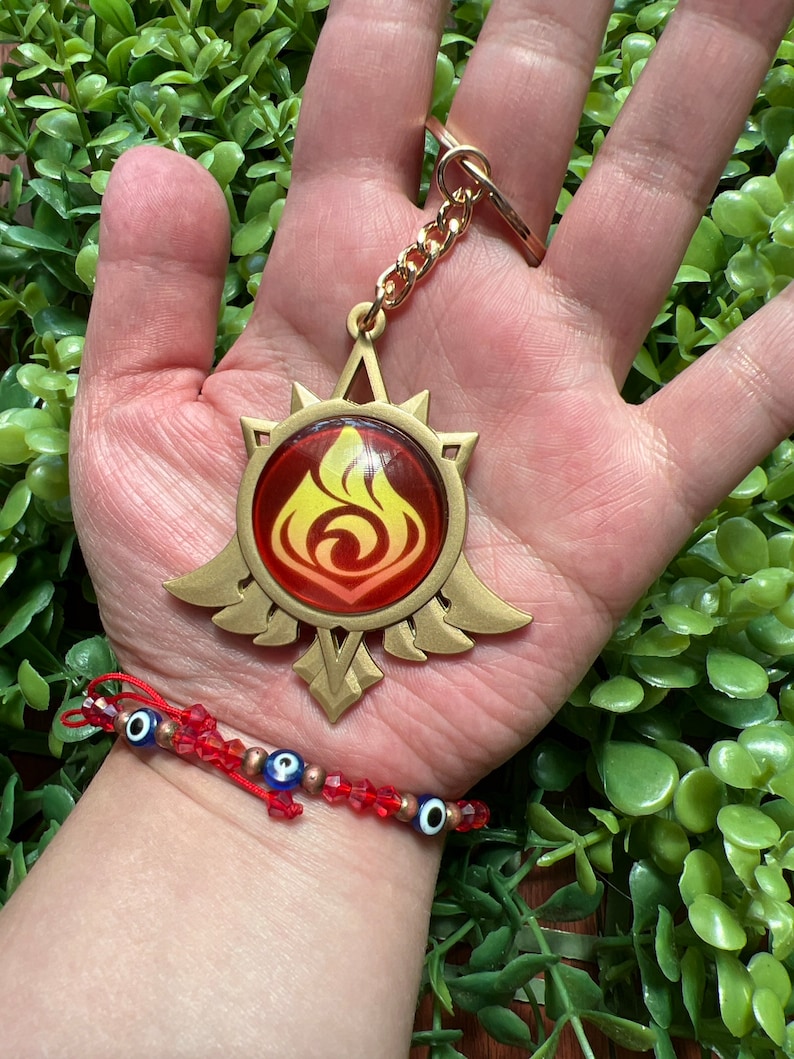 Genshin Impact Pyro Vision Keychain - Etsy