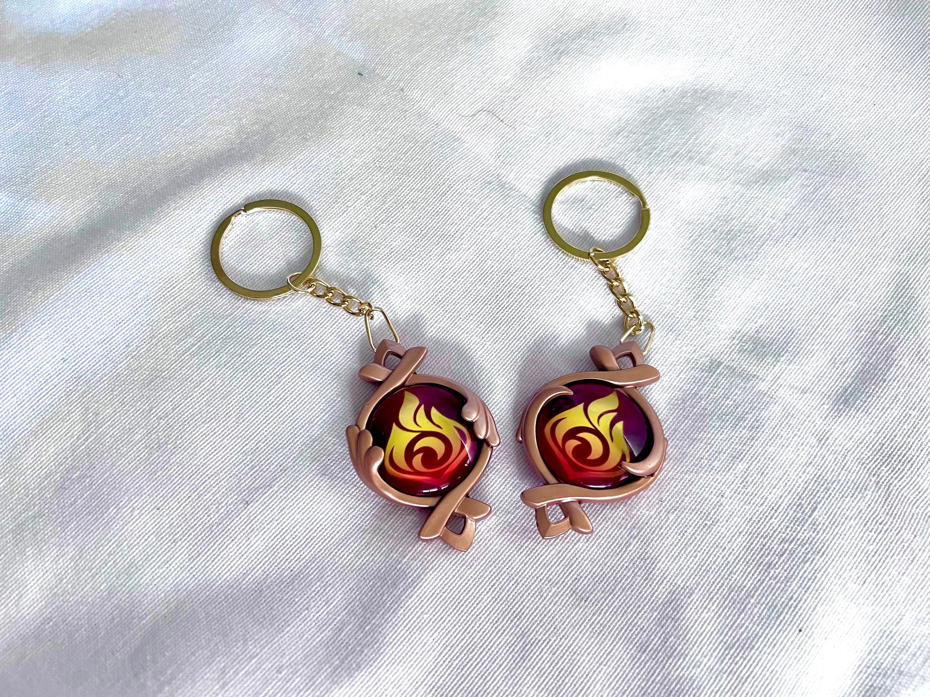 Genshin Impact Pyro Vision Keychain - Etsy