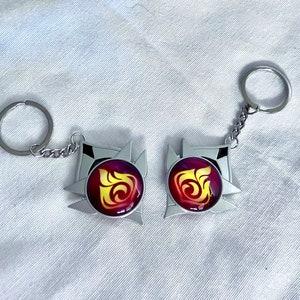 Genshin Impact Pyro Vision Keychain - Etsy