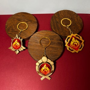 Genshin Impact Pyro Vision Keychain - Etsy