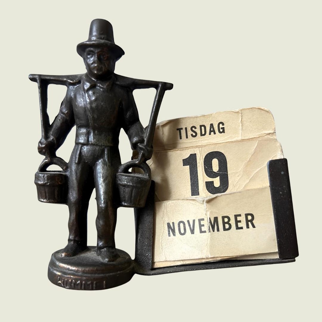 Vintage German Cast Iron Water‑carrier Perpetual Desk Calendar Figurine ...