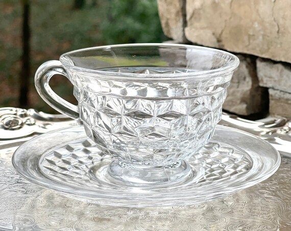 Glass cup and saucer store