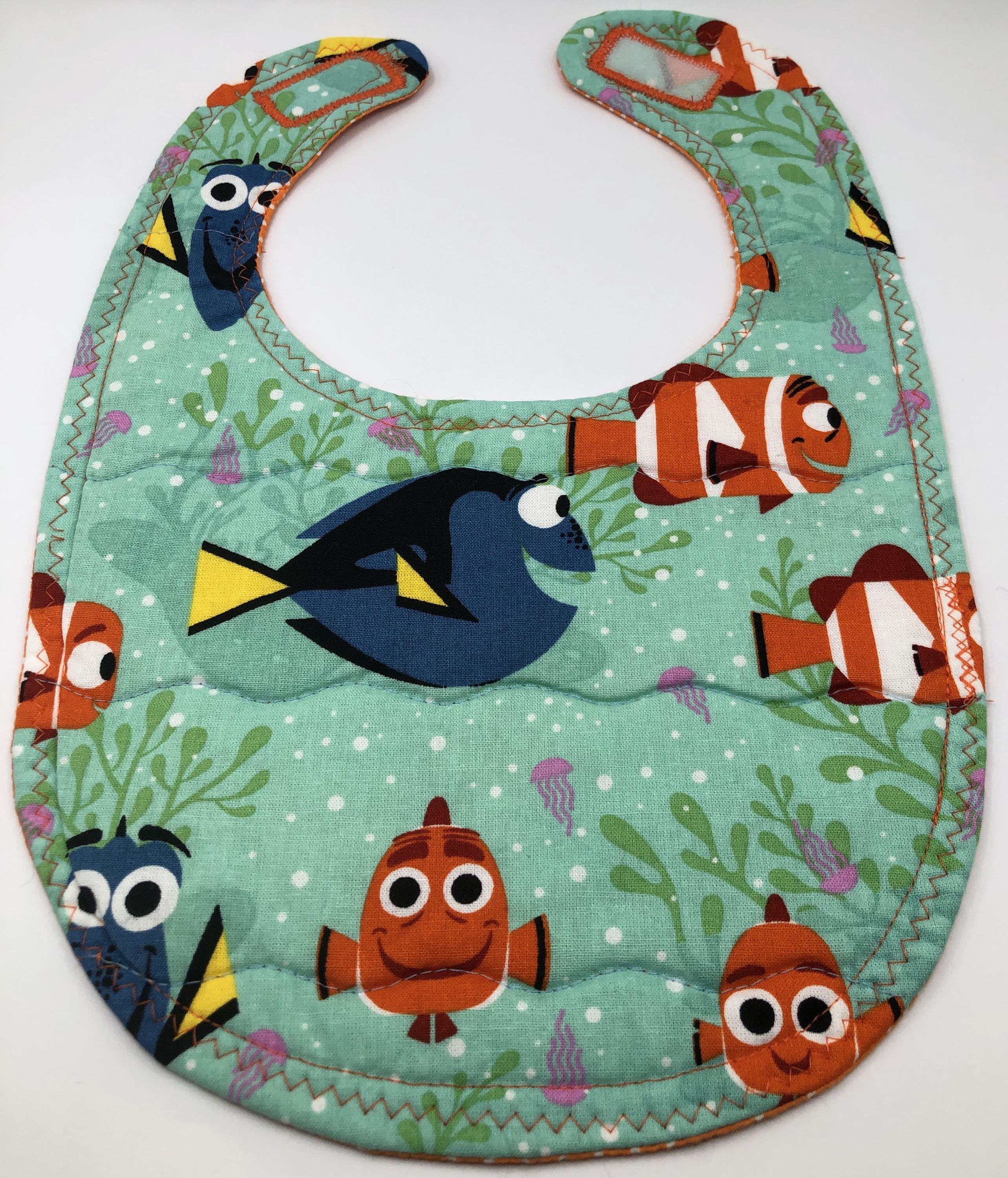 Finding Nemo Dory Deluxe Bib Quilt: Adjustable Durable Reversible ...
