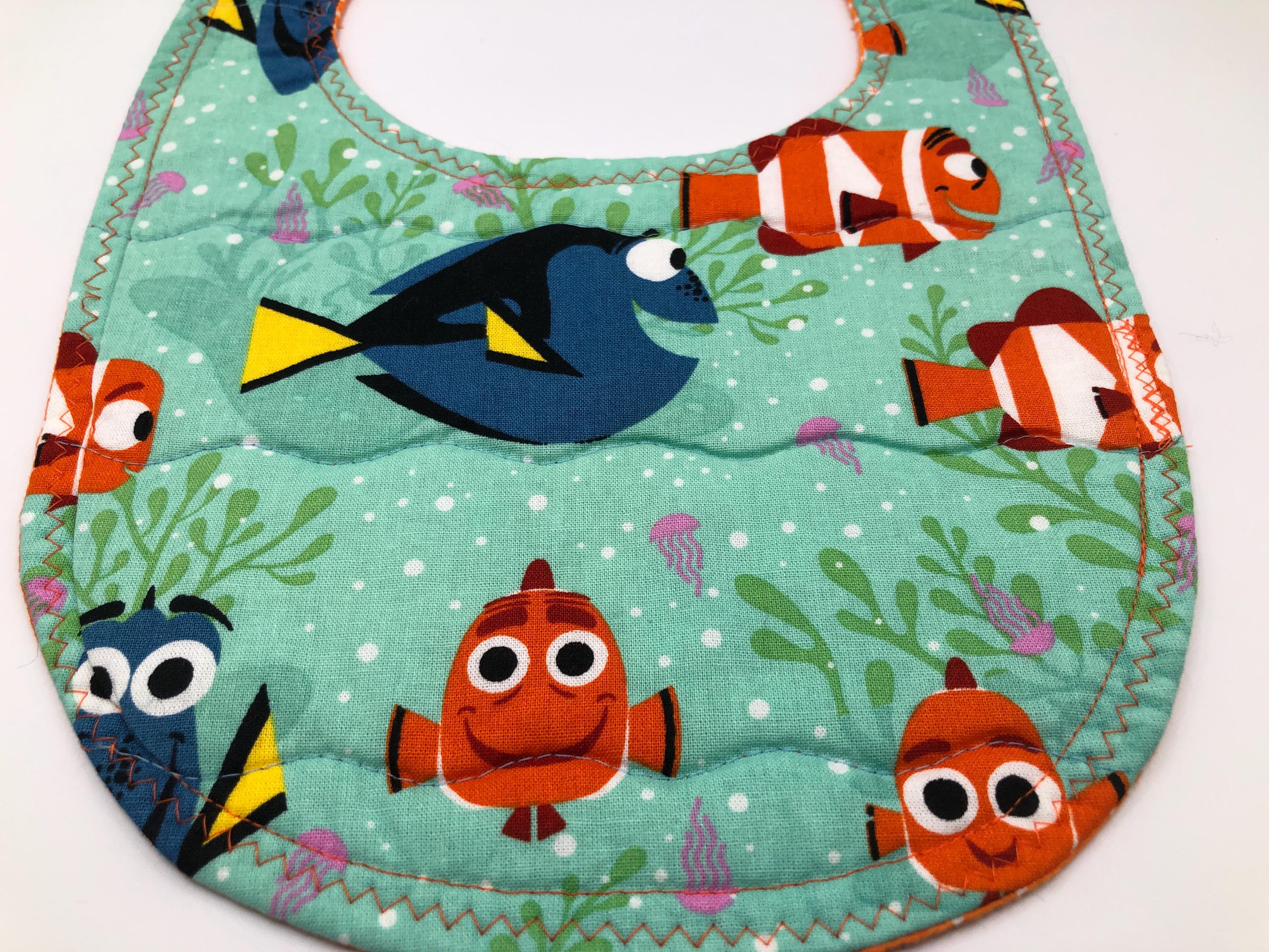 Finding Nemo Dory Deluxe Bib Quilt: Adjustable Durable Reversible ...