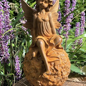 Gorgeous Garden Fairy - Cast Iron Elf Sitting on a Sphere of Flowers ...