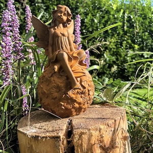 Gorgeous Garden Fairy - Cast Iron Elf Sitting on a Sphere of Flowers ...