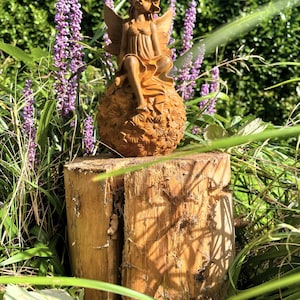 Gorgeous Garden Fairy - Cast Iron Elf Sitting on a Sphere of Flowers ...