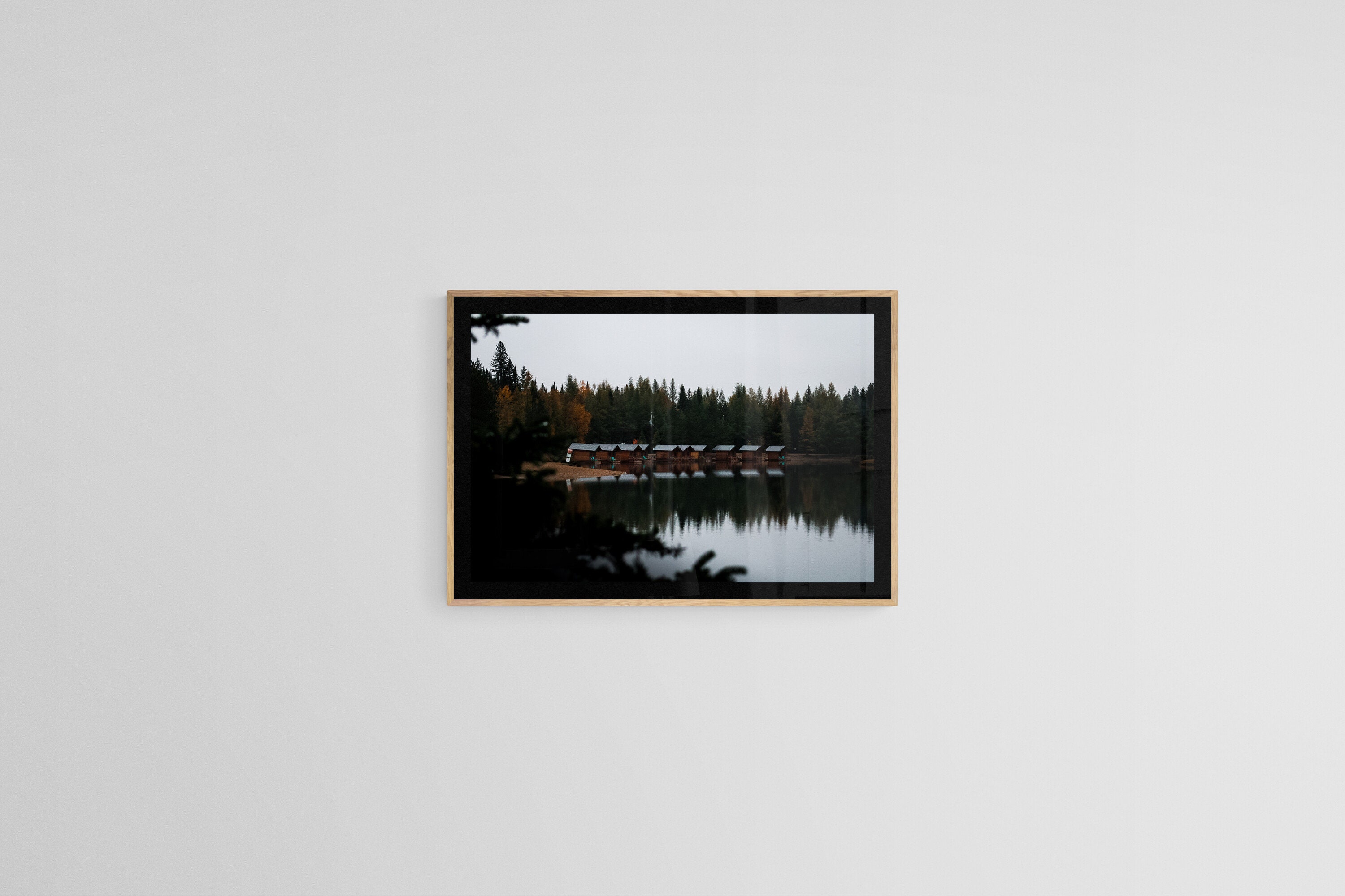 Remote Cabin in the Woods, A Line of Small Cabins Circle the Shore of ...