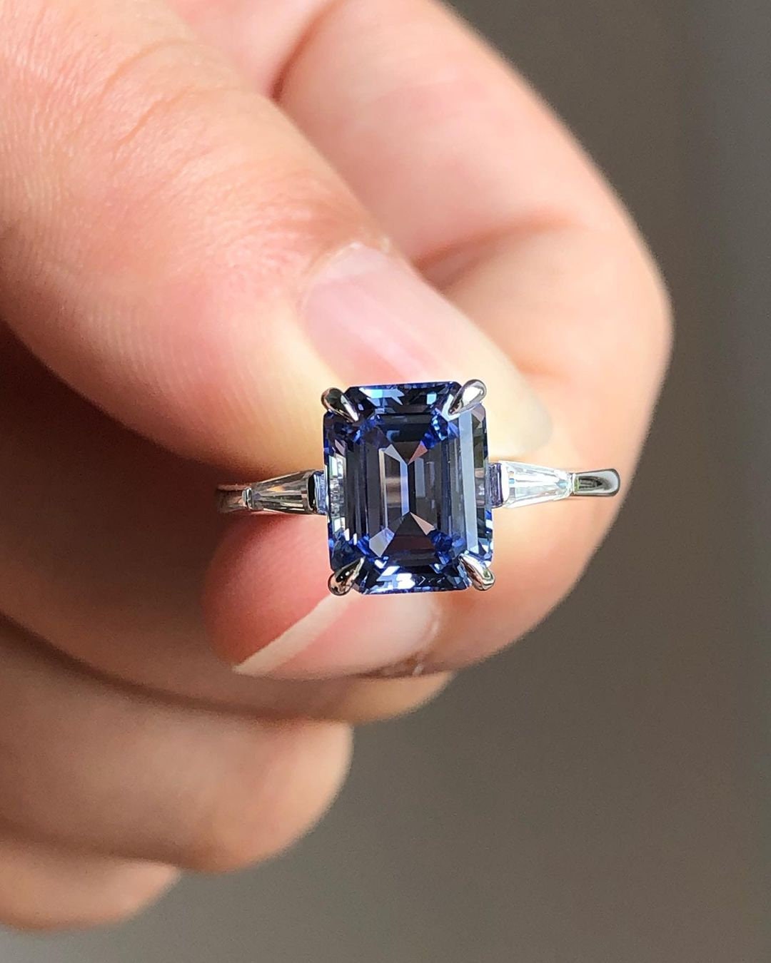 Blue Emerald Cut Solitaire With Side Stone Tapered Baguette Cut Cz Ring ...