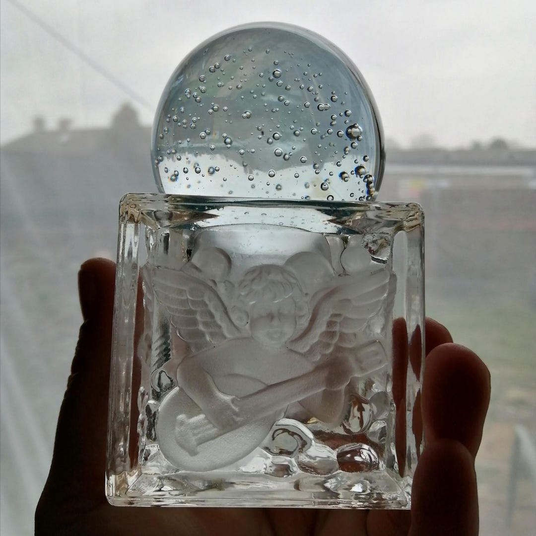 Cherub Crystal Ball. Glass Blown Bubble Scrying Orb on Glass Cherub ...