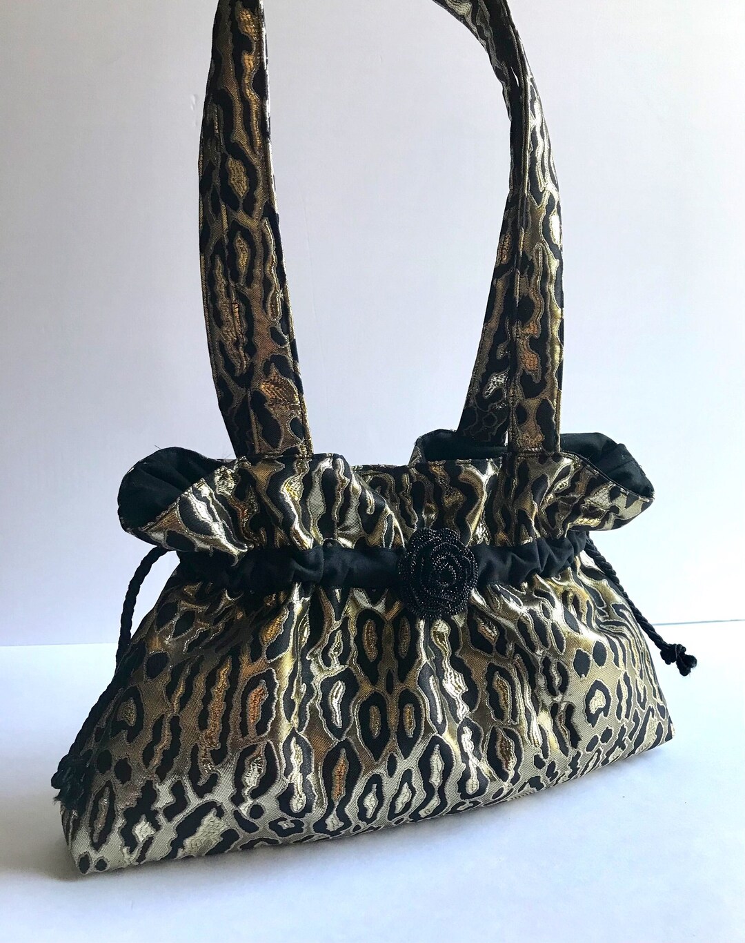 Trendy Cheetah Print Shoulder Bag With Flower Button; Black and Gold ...