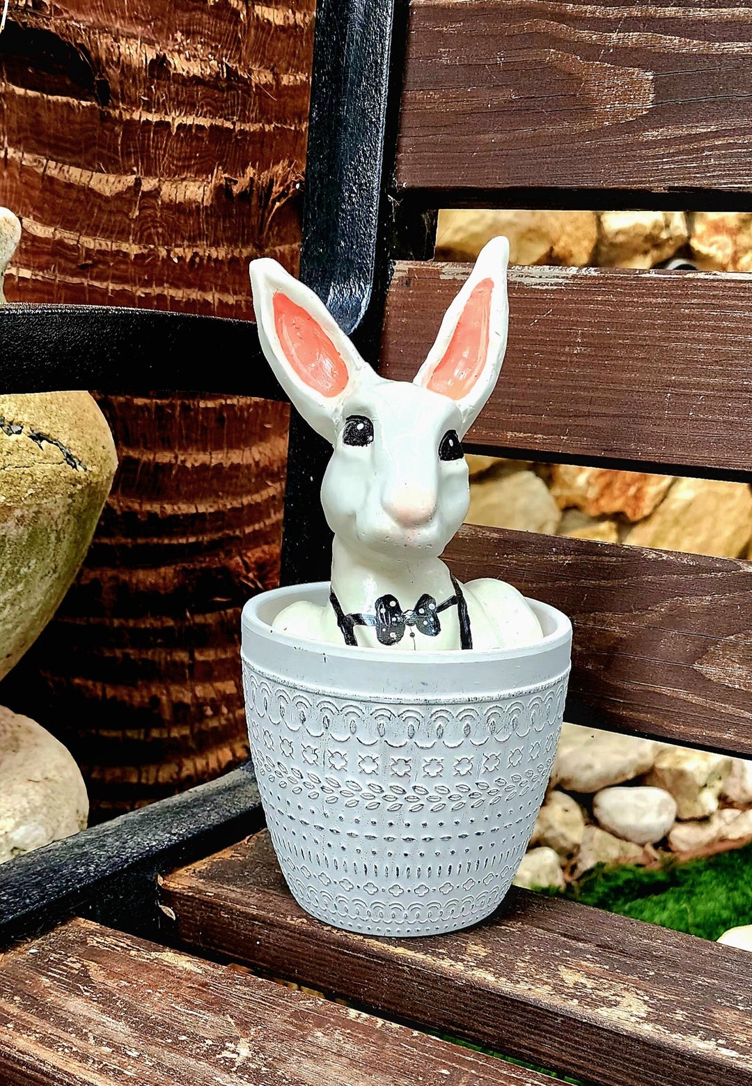 Charming Clay Pot Adornment Featuring a Delightful Plaster Rabbit ...