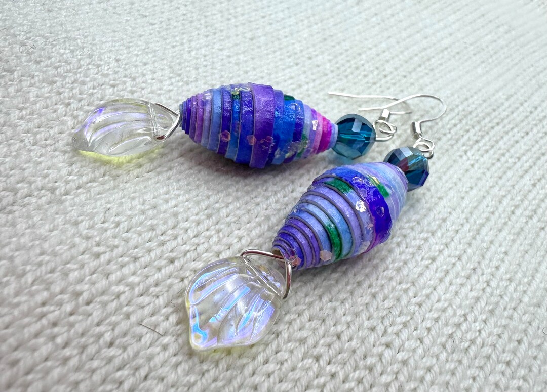 Whimsical Seashell-inspired Earrings handcrafted With Purple Hues and a ...