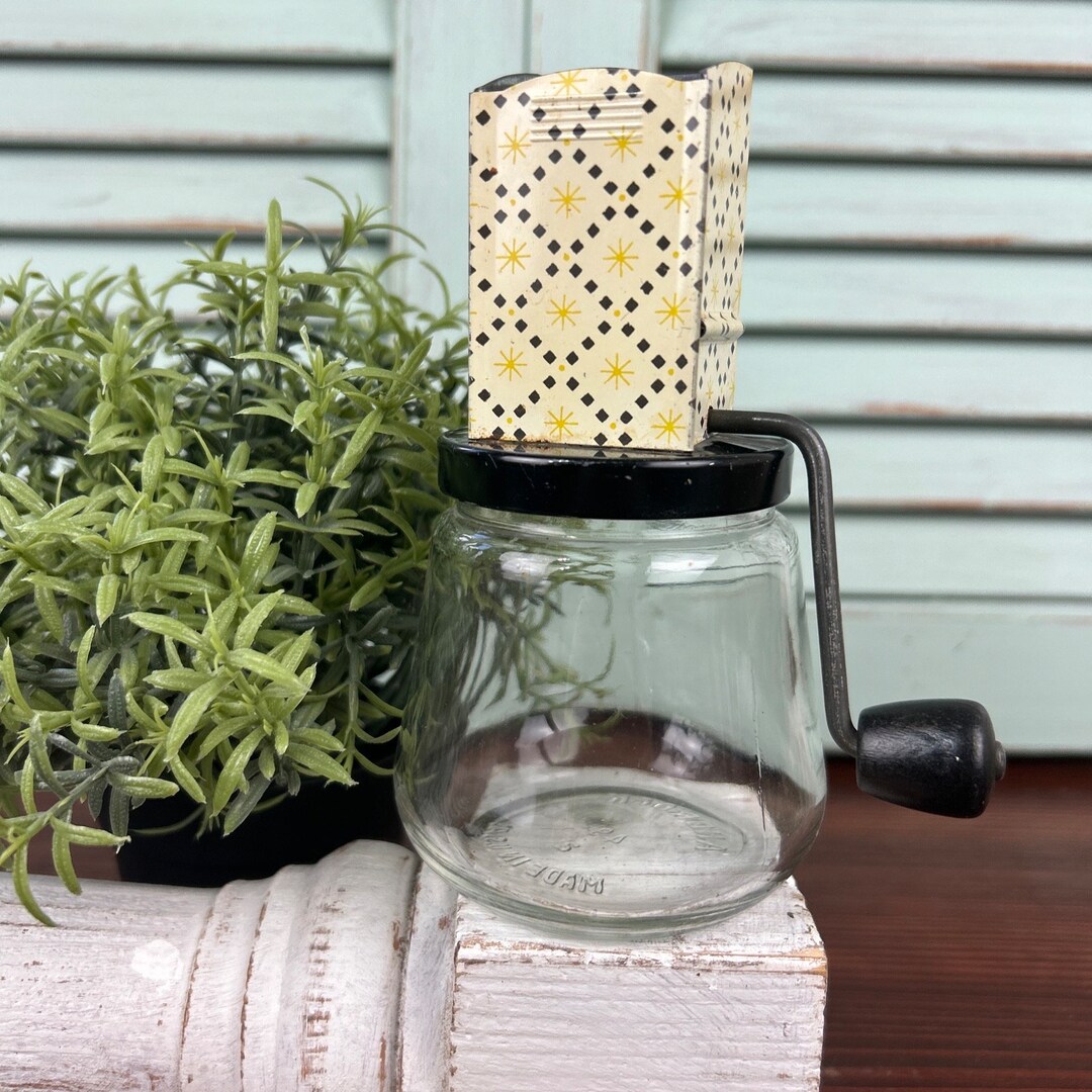 Vintage Androck Nut Grinder. Retro Kitschy Black Yellow Starburst ...
