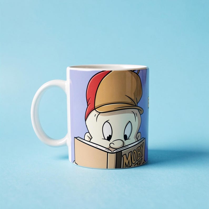 Elmer is Reading | Classic Cartoon Funny Mug | Bookworm Gift | Moby ...