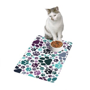 Pet Food Mat (12x18) Stylish Paw Print Scatter Design in Shades of Plum ...