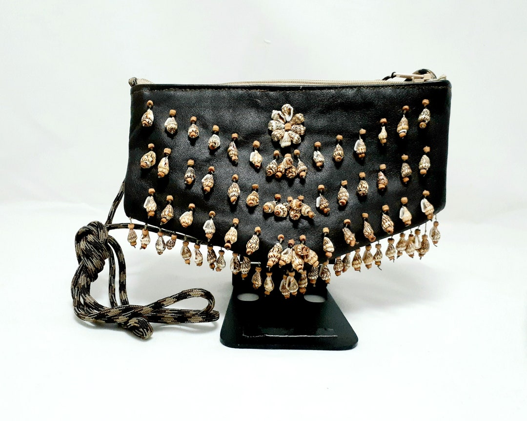 LEATHER & SHELLS II - Etsy
